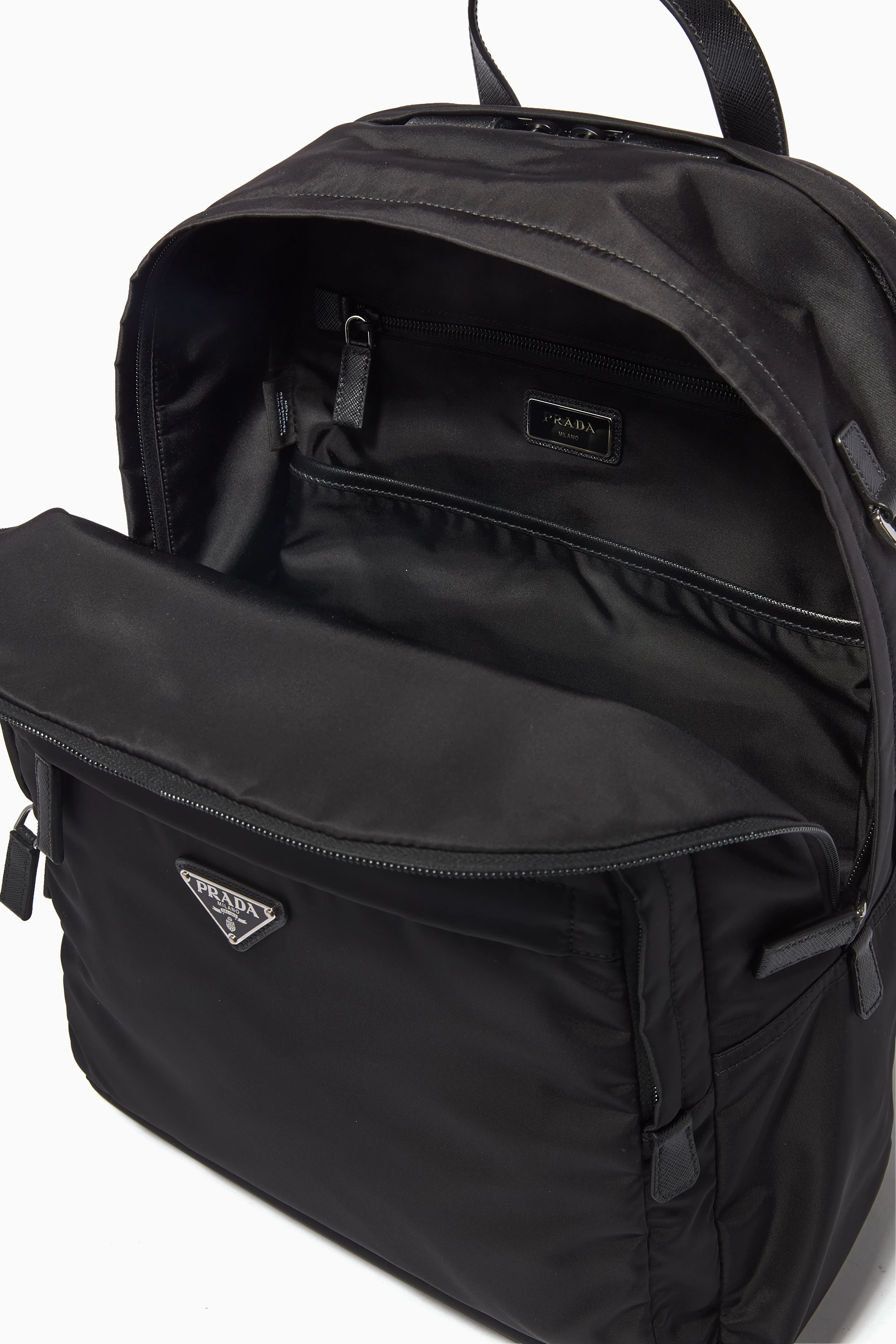 black backpack with triangle logo